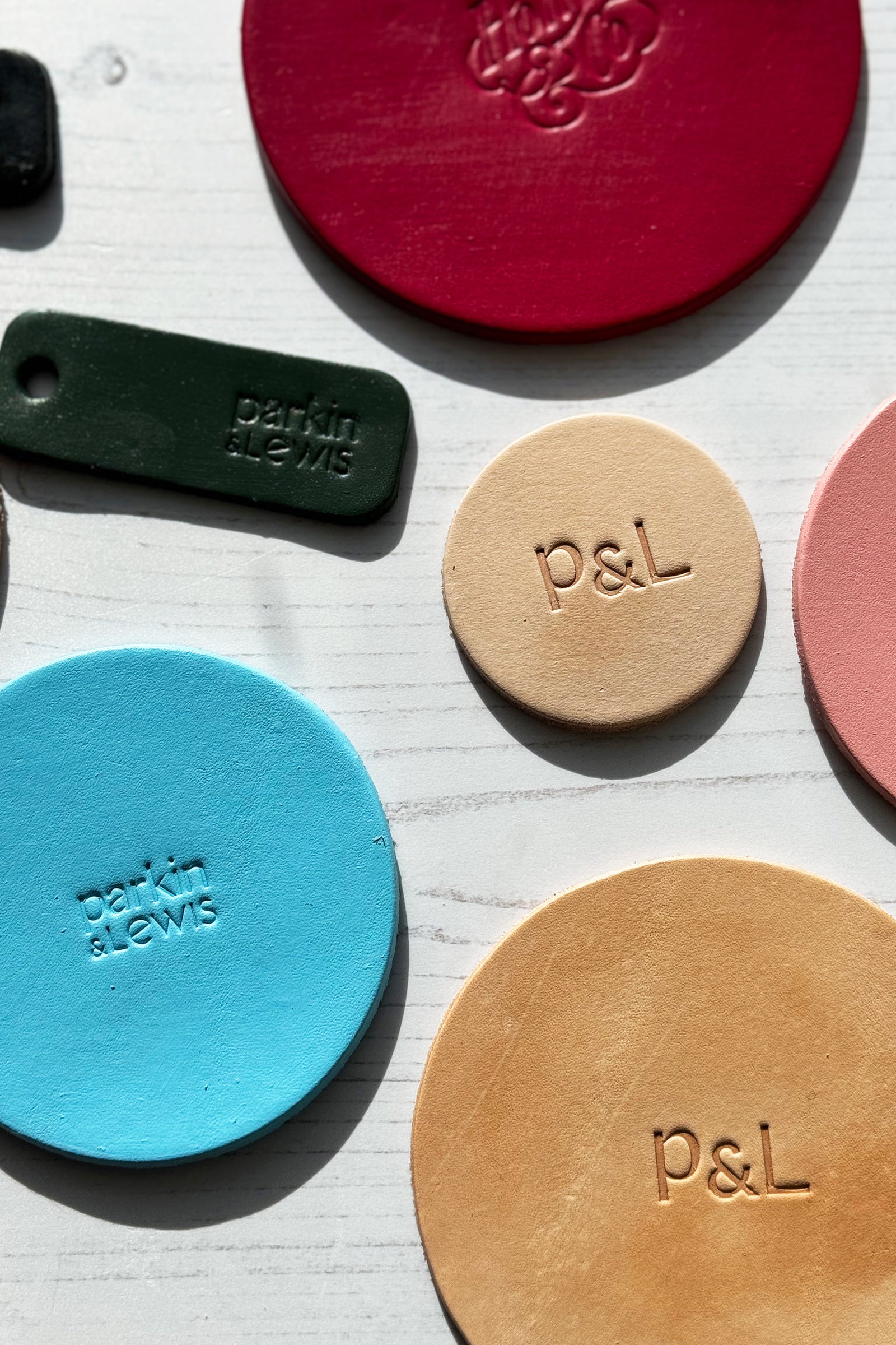 Debossed Logo on a Coaster – Parkin and Lewis